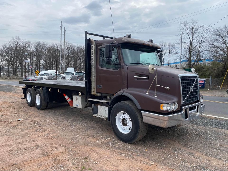 Volvo VHD64B Trucks - Dump transport quote to Norton, MA. VeriTread ...